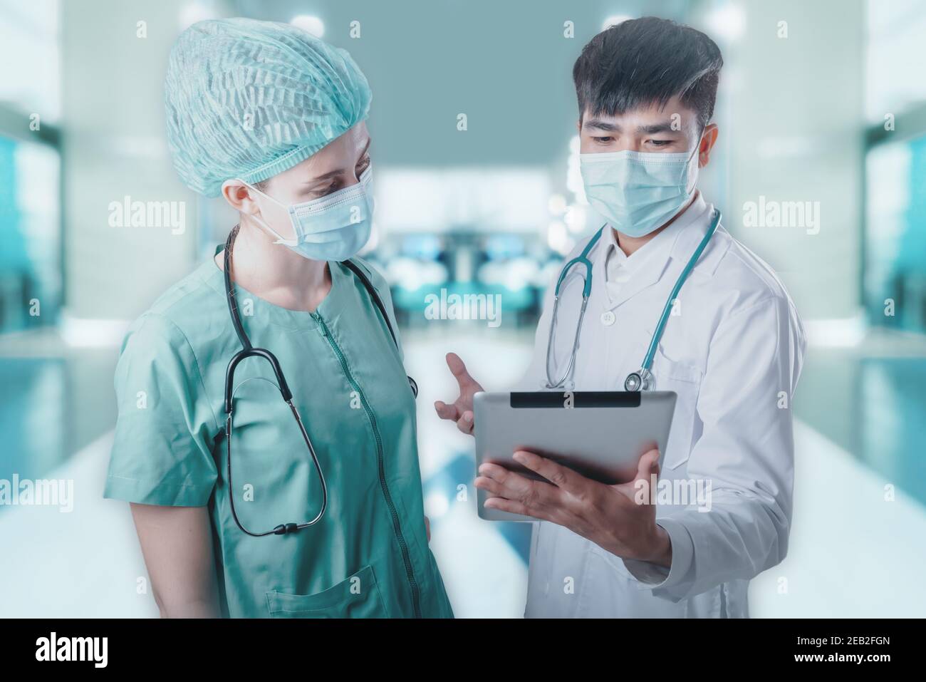 Doctor Team Discussion Patient Diagnosis Report on Tablet Against ...