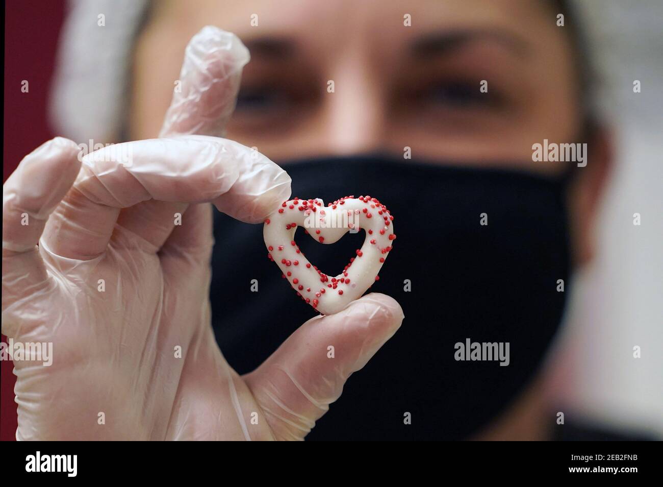 St. Louis, United States. 11th Feb, 2021. Candy sales person Susan ...