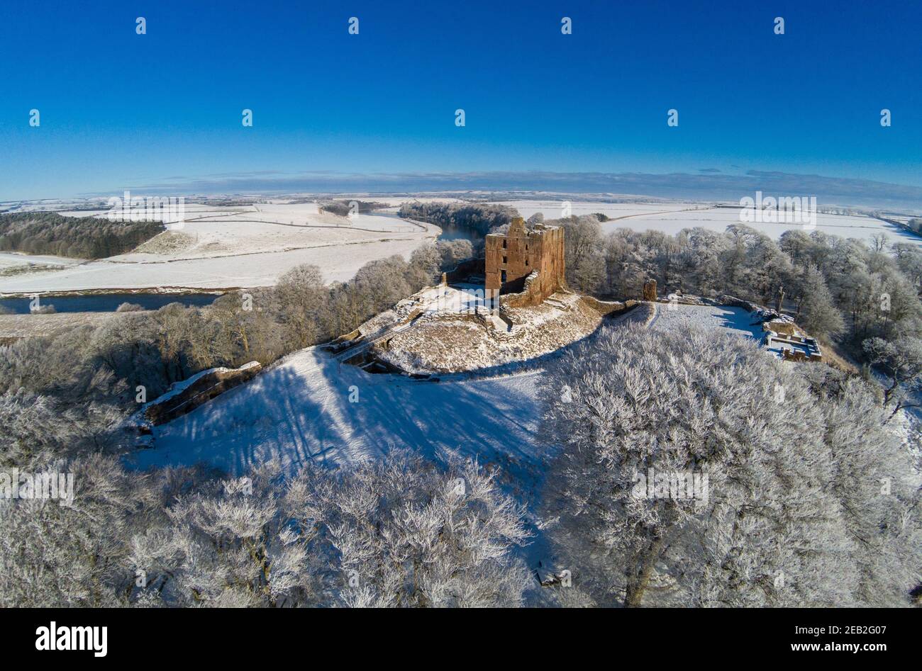Aerial view of Norham Castle which stands guard over the River Tweed a ...