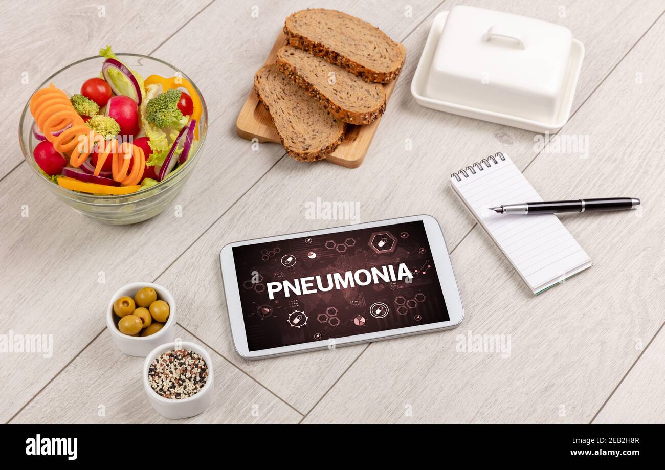 Healthy Tablet Pc compostion with PNEUMONIA inscription, immune system ...