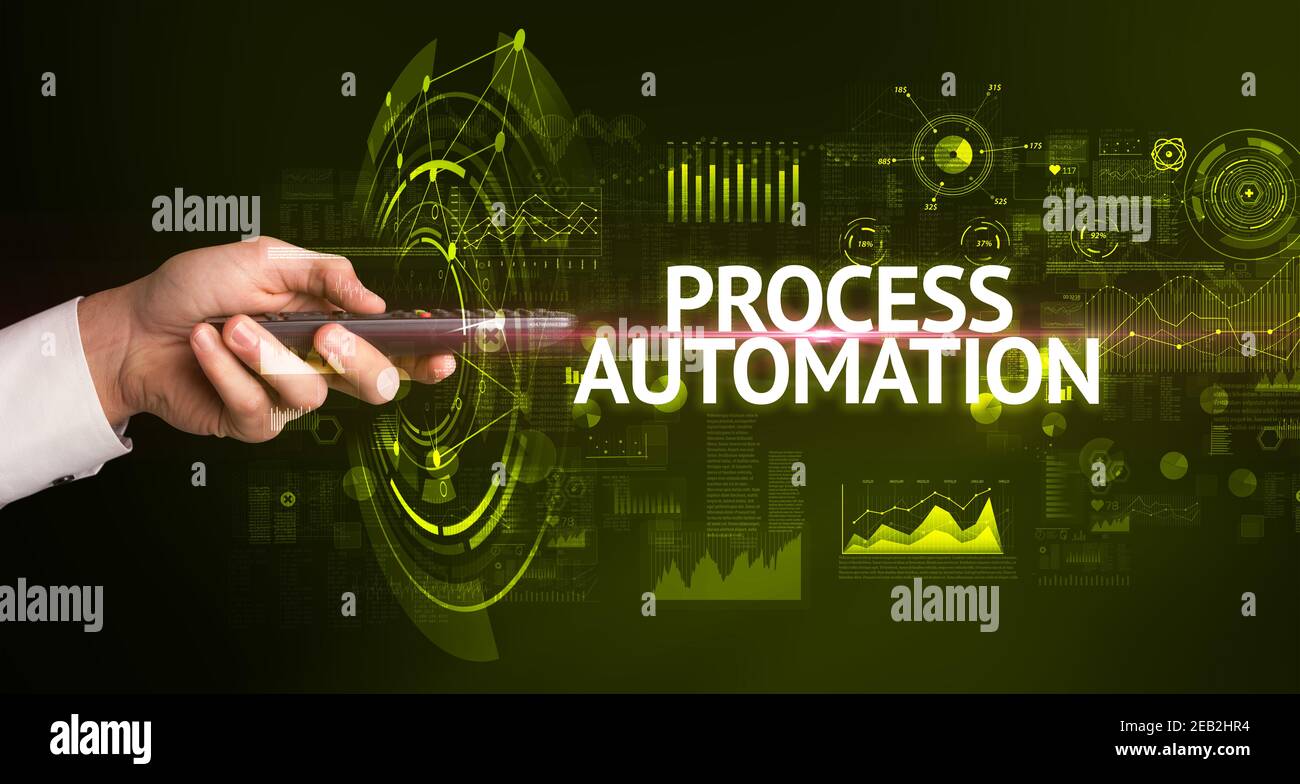 hand holding wireless peripheral with PROCESS AUTOMATION inscription ...