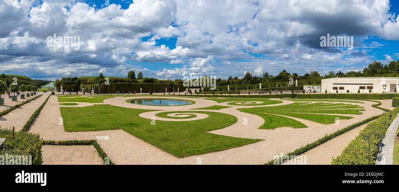 The Gardens of Versailles in a beautiful summer day in Paris, France ...