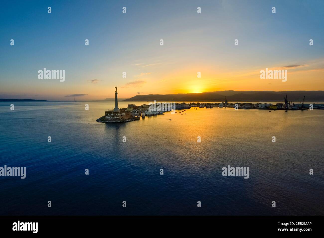 A beautiful sunset behind the golden Madonnina column guarding the port ...