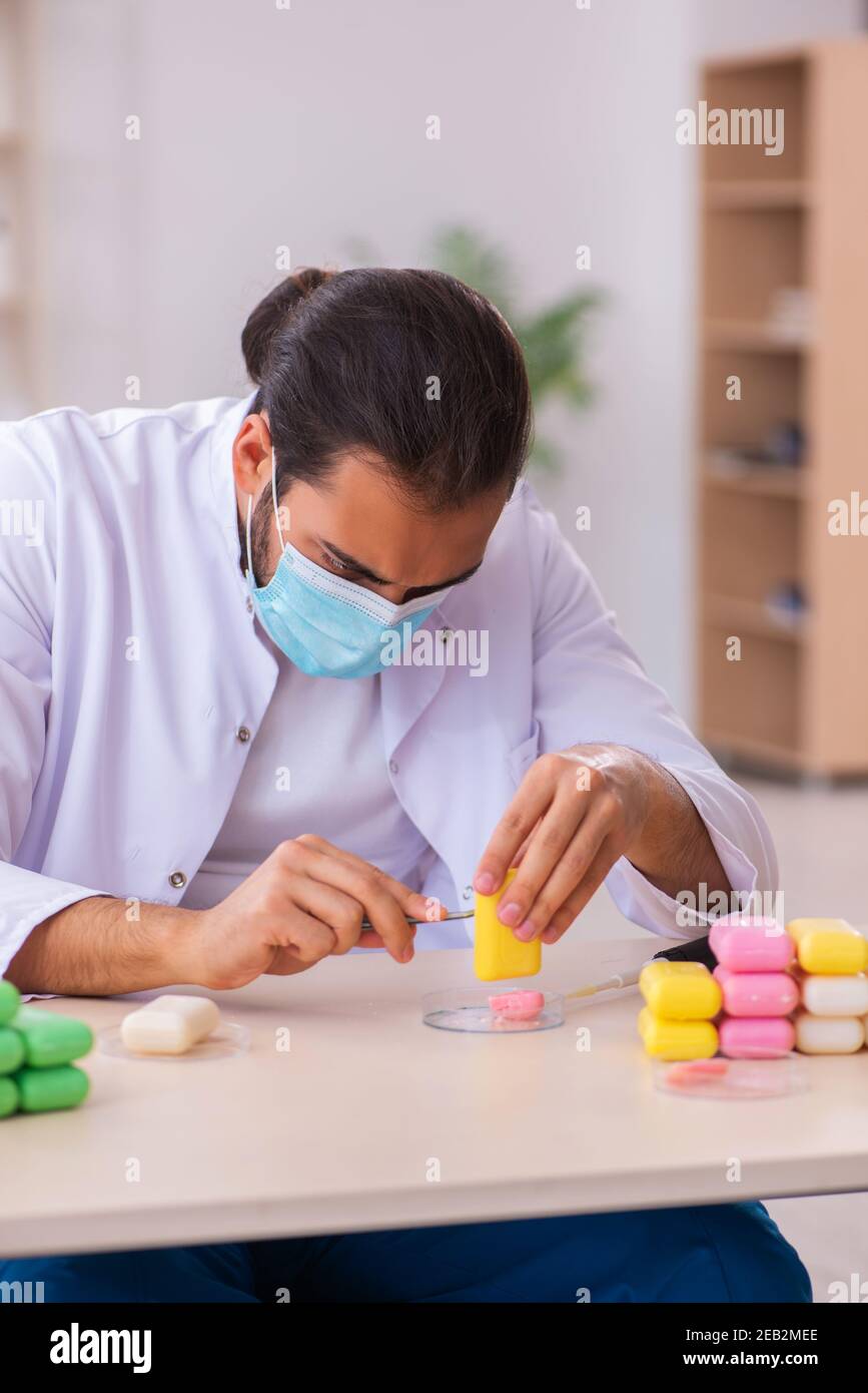 Young chemist testing soap in the lab Stock Photo - Alamy