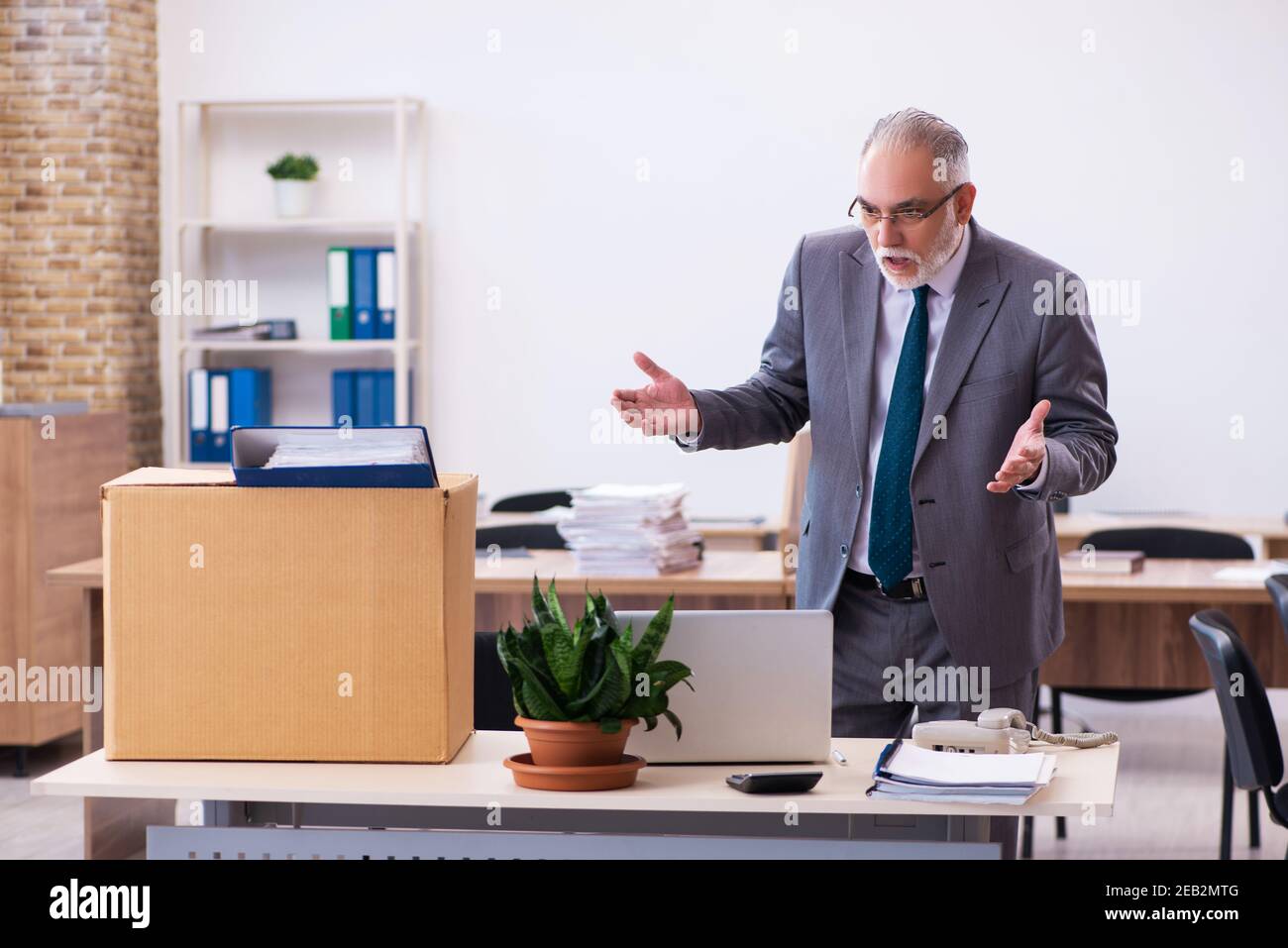 Old employee being fired from his work Stock Photo - Alamy