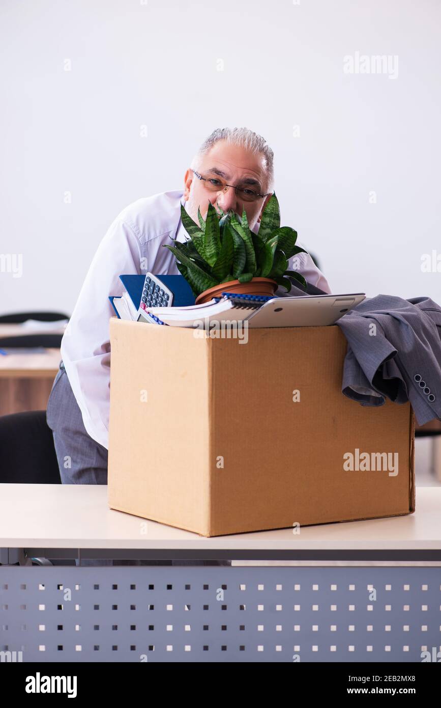 Old employee being fired from his work Stock Photo - Alamy