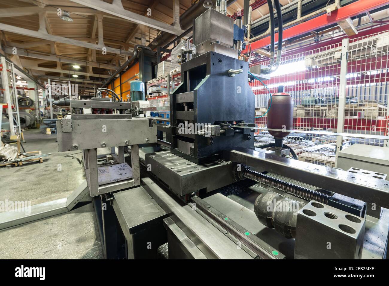 Roller forming machine. The interior of the plant producing a metal ...