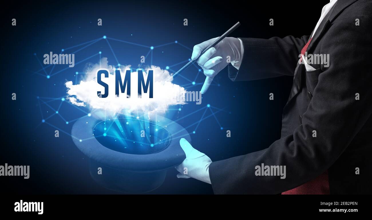 Magician is showing magic trick with SMM abbreviation, modern tech ...