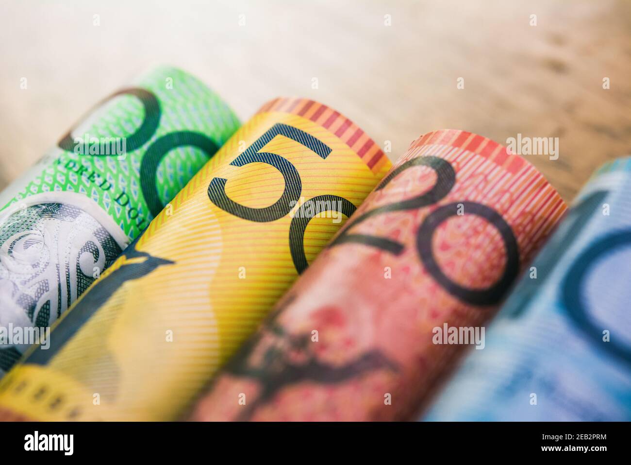 Differnt colors of Australian currency banknote money rolls on wood ...
