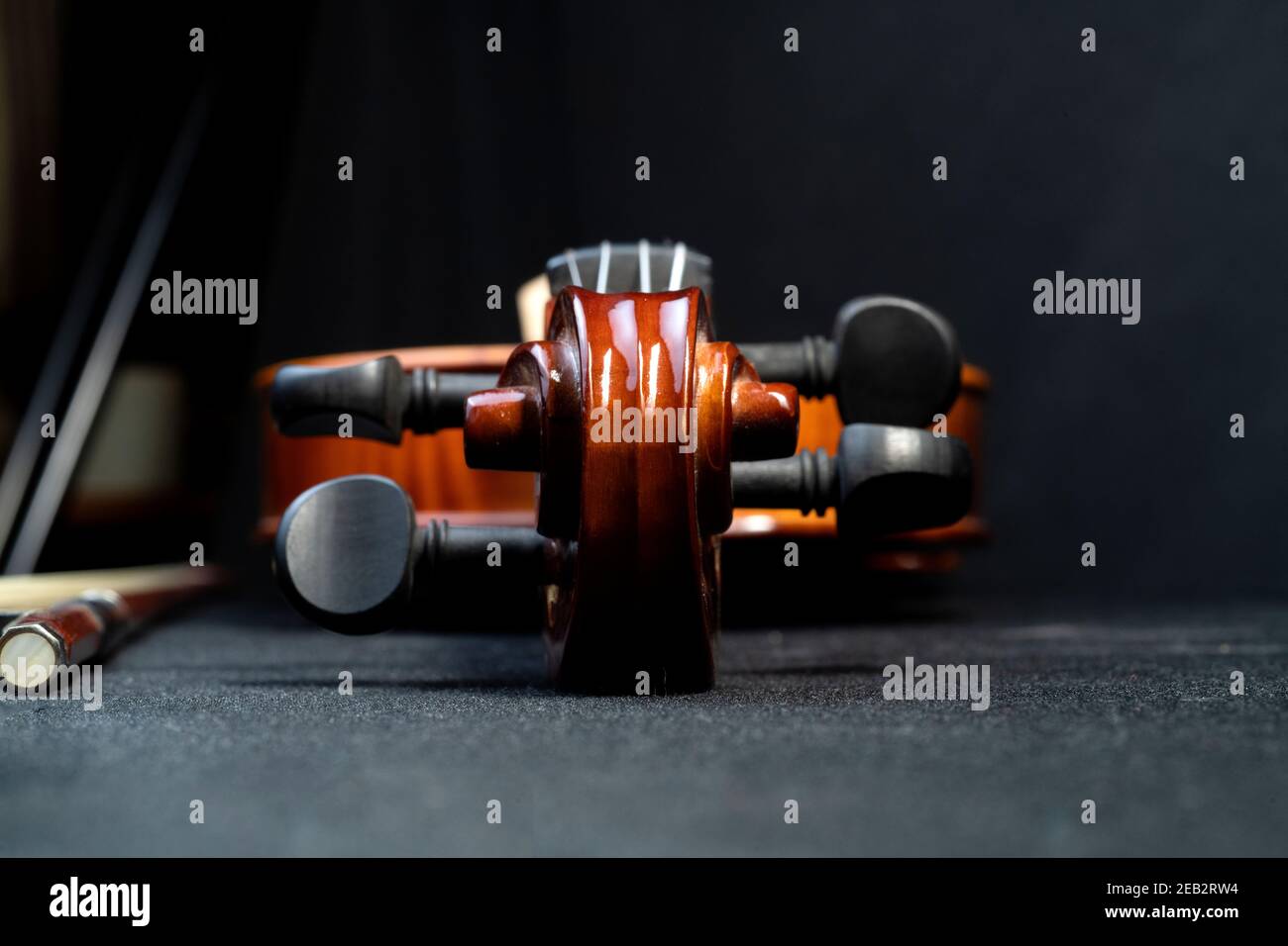 Full profile of beautiful violin on black background Stock Photo - Alamy