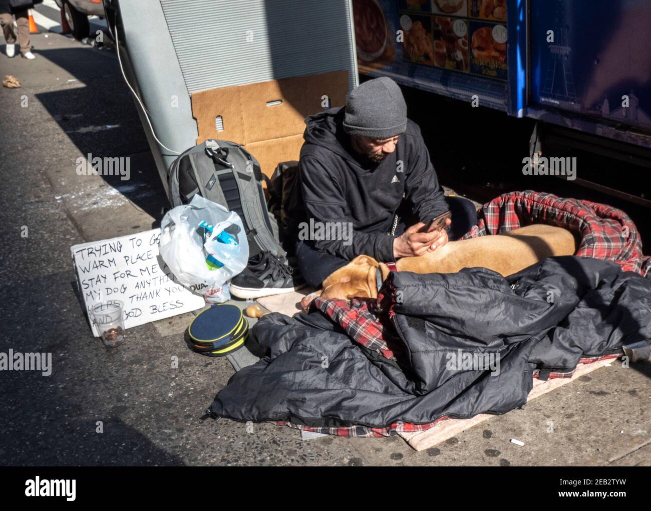 Homeless man with dog hi-res stock photography and images - Alamy