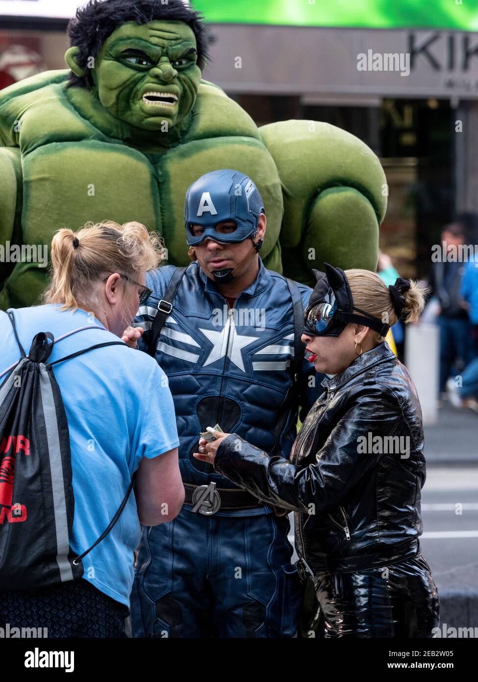 A man in a Captain America costume works in Times Square for tips in ...