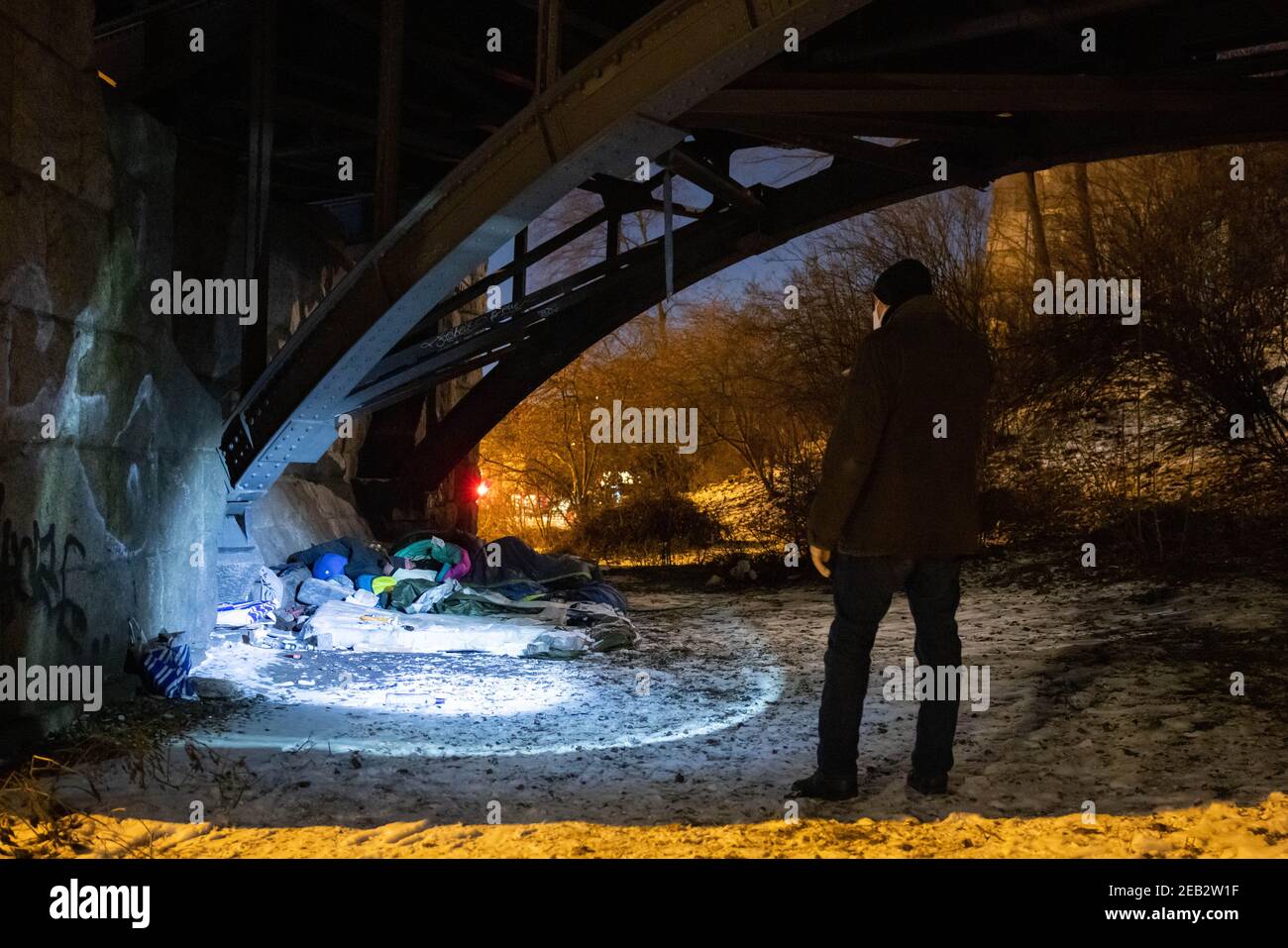 Homeless people sleeping under bridge hi-res stock photography and ...