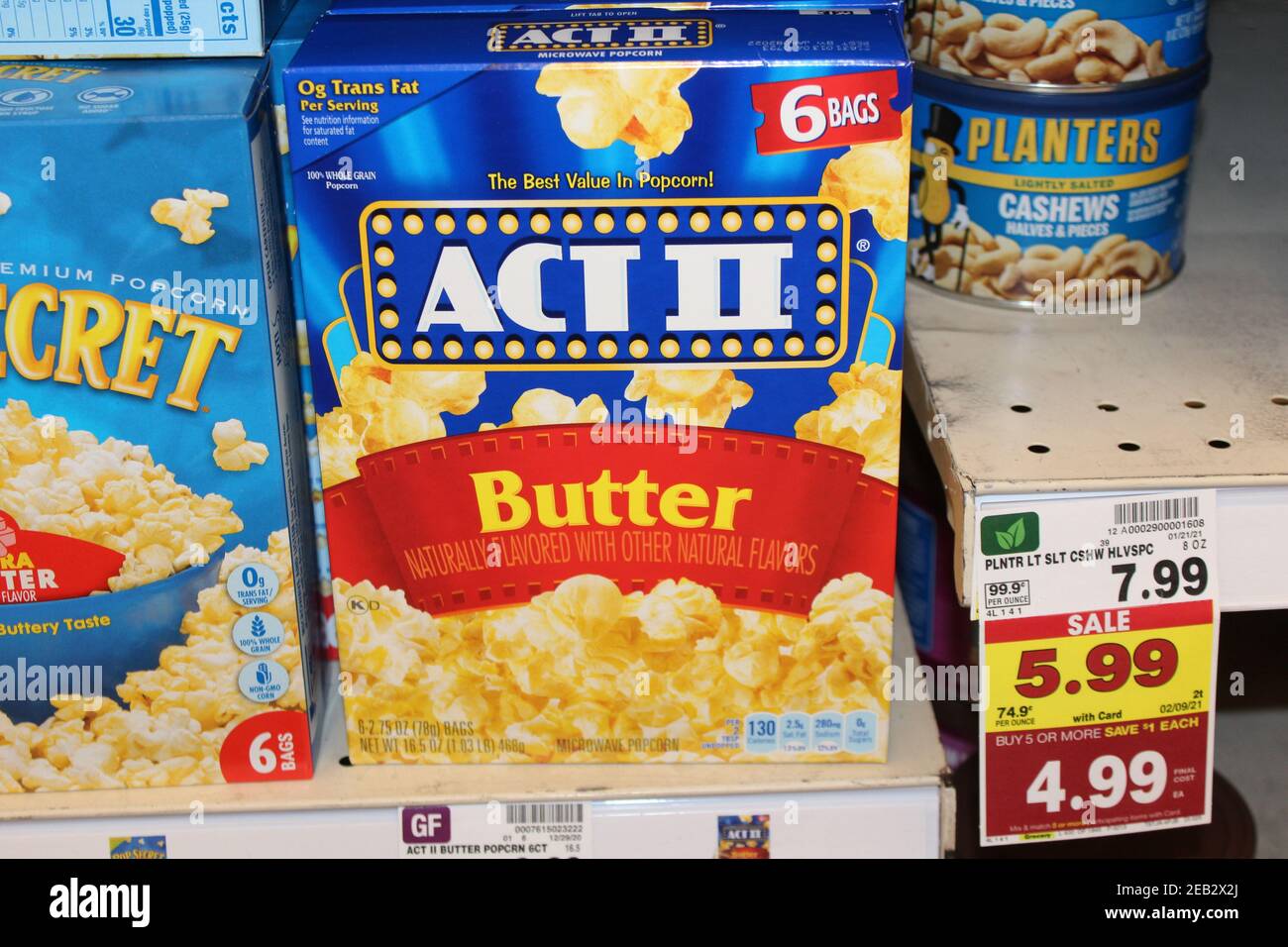 Act II pop corn shot closeup on a metal shelf shot closeup at a grocery ...