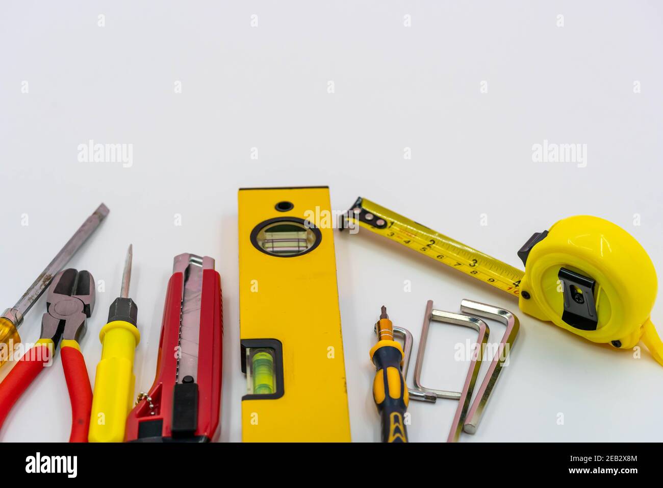 Top view of Working tools of a handy man on white background.flat lay ...