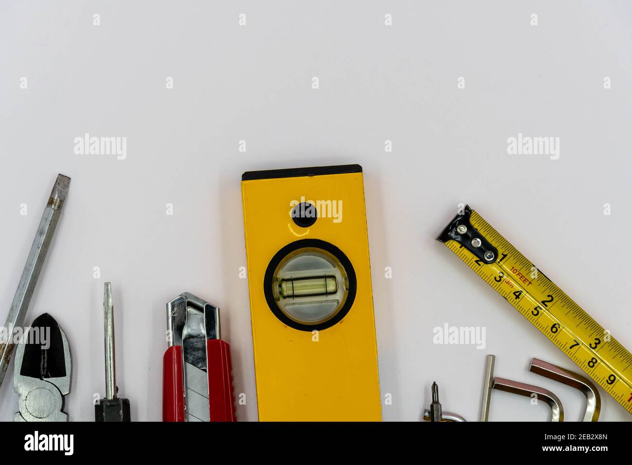 Top view of Working tools of a handy man on white background.flat lay ...