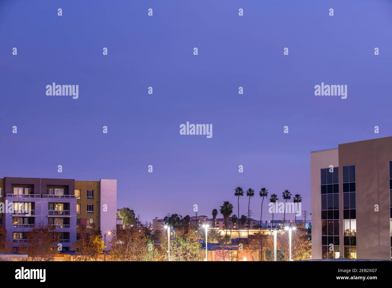 Twilight view of the downtown skyline of Downey, California, USA Stock ...
