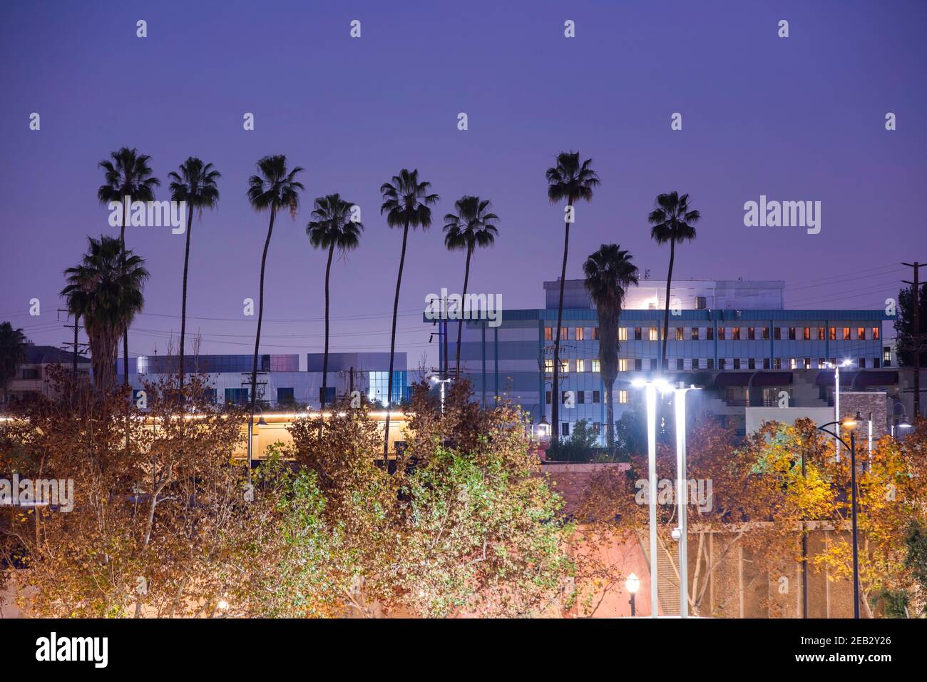 Twilight view of the downtown skyline of Downey, California, USA Stock ...