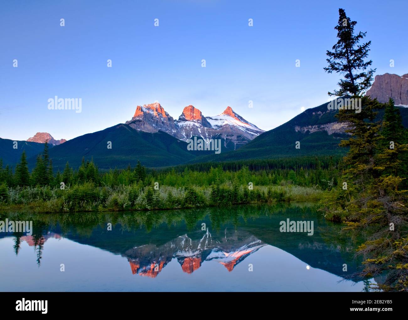 Three Sisters at Sunrise near Canmore, Alberta, Canada Stock Photo - Alamy