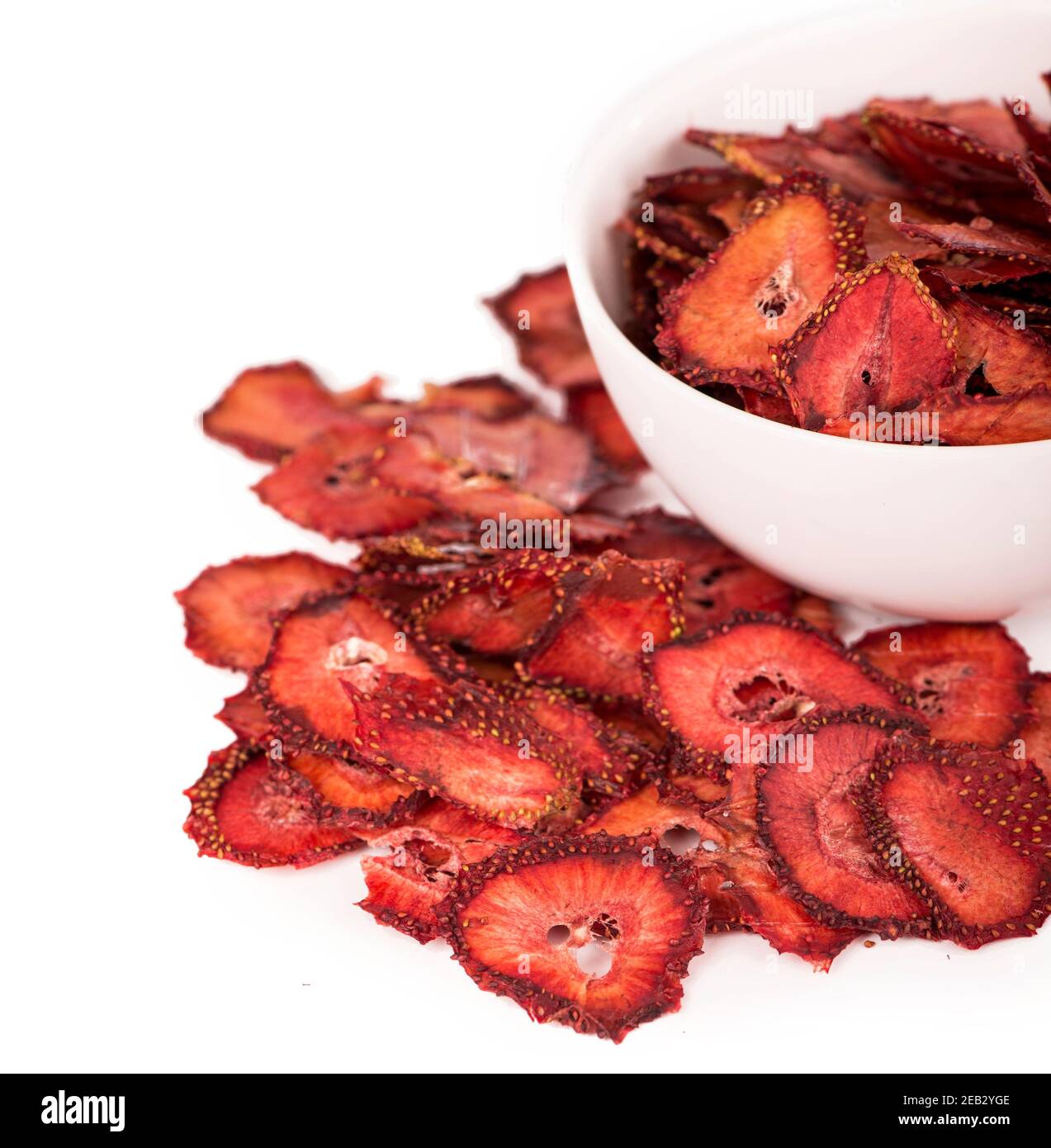 dry strawberry in a white plate it is isolated Stock Photo - Alamy