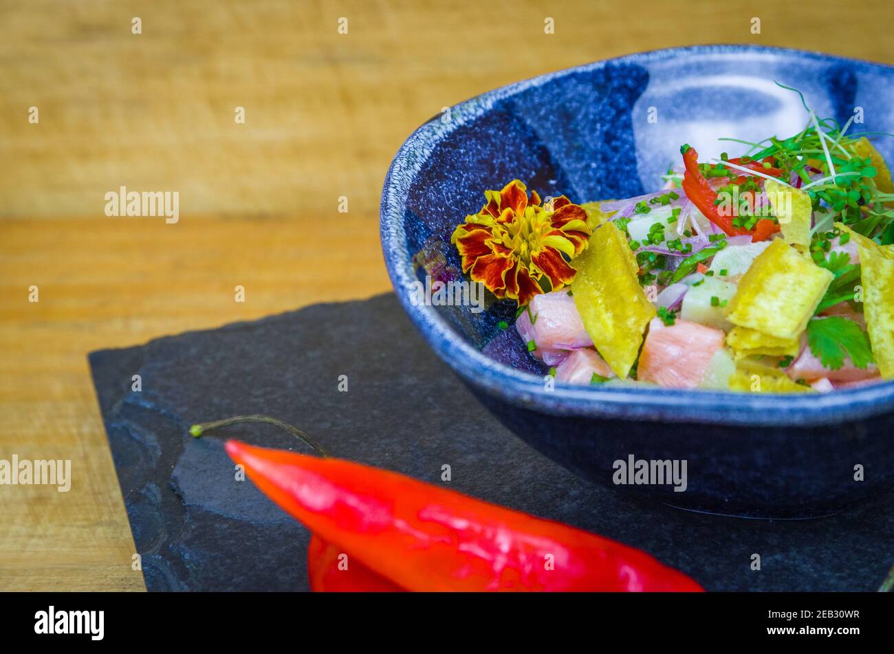 Beautiful decorated ceviche dish. Premium Peruvian food Stock Photo - Alamy