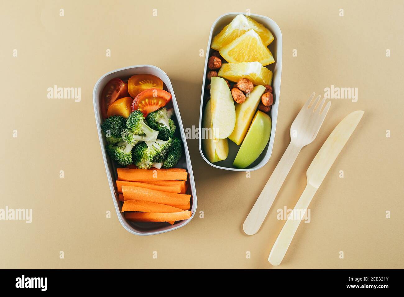 Lunch boxes with vegetables and fruits. Wooden cutlery, zero waste, eco ...