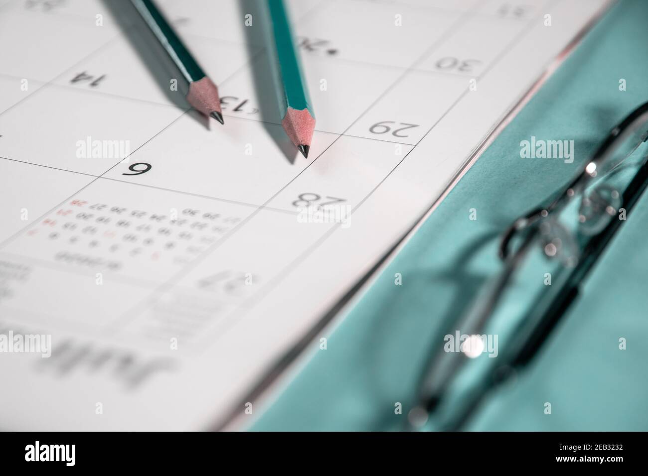 blank calendar for note and pencils with glasses, for work management ...