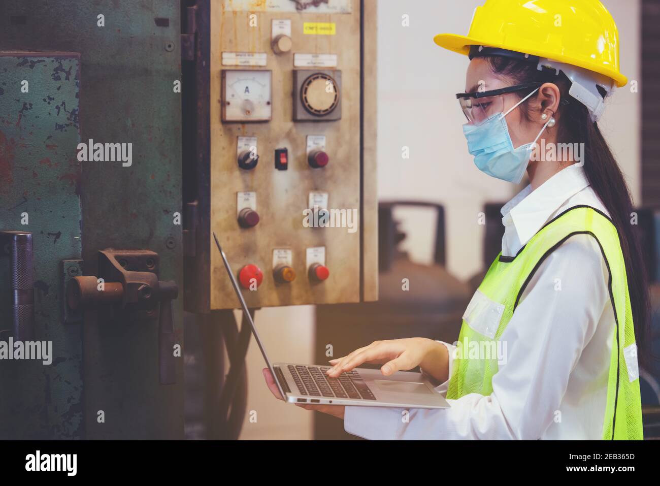 Industrial factory maintenance engineers woman inspect relay protection ...