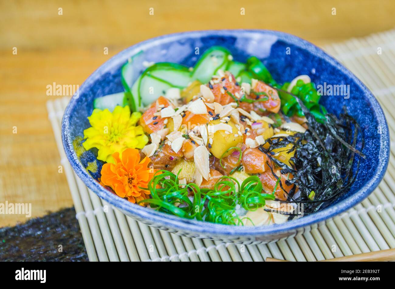 Traditional poke in beautiful decorated dish Stock Photo - Alamy