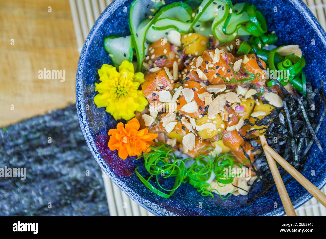 Traditional poke in beautiful decorated dish Stock Photo - Alamy