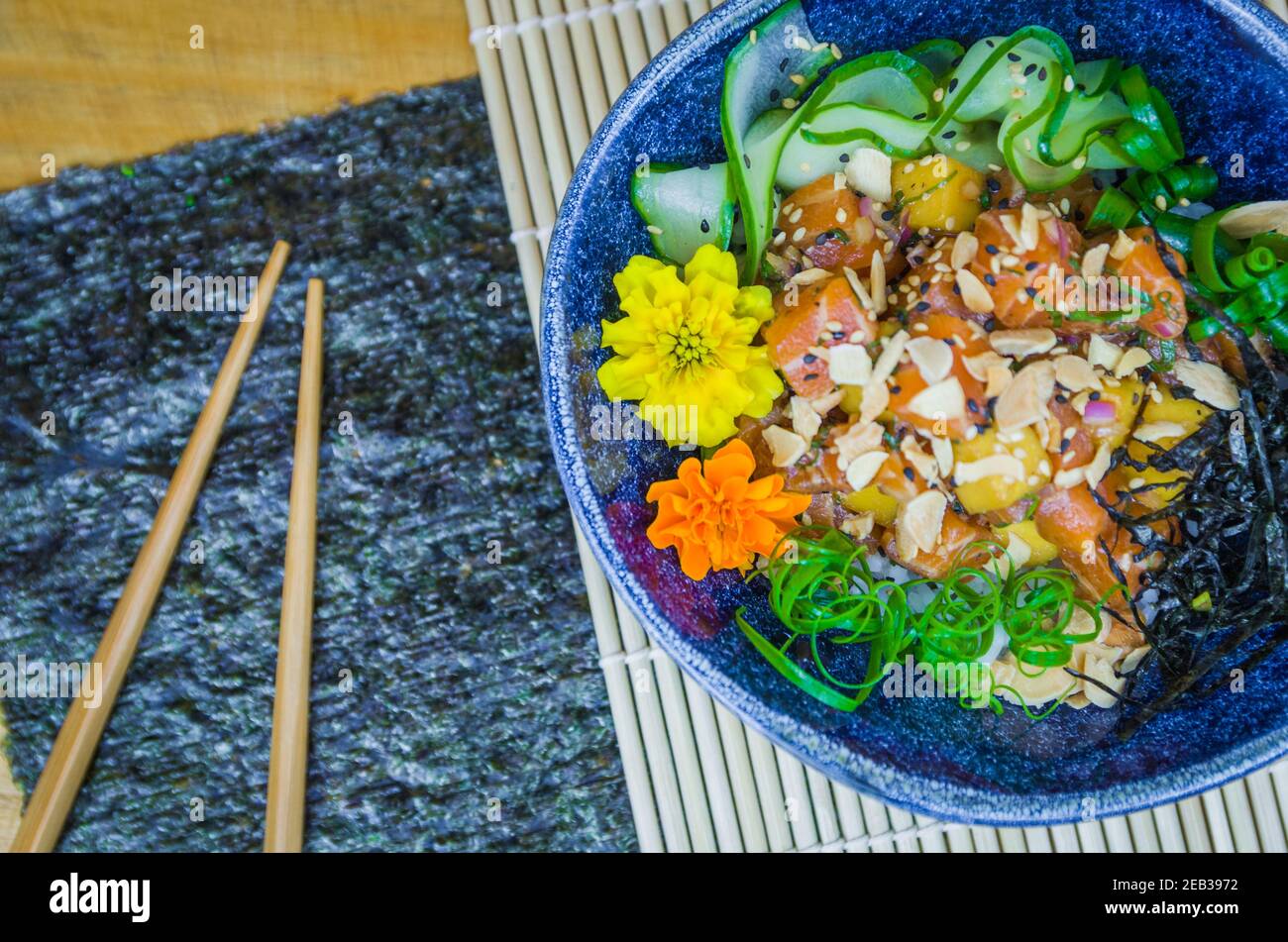 Traditional poke in beautiful decorated dish Stock Photo - Alamy