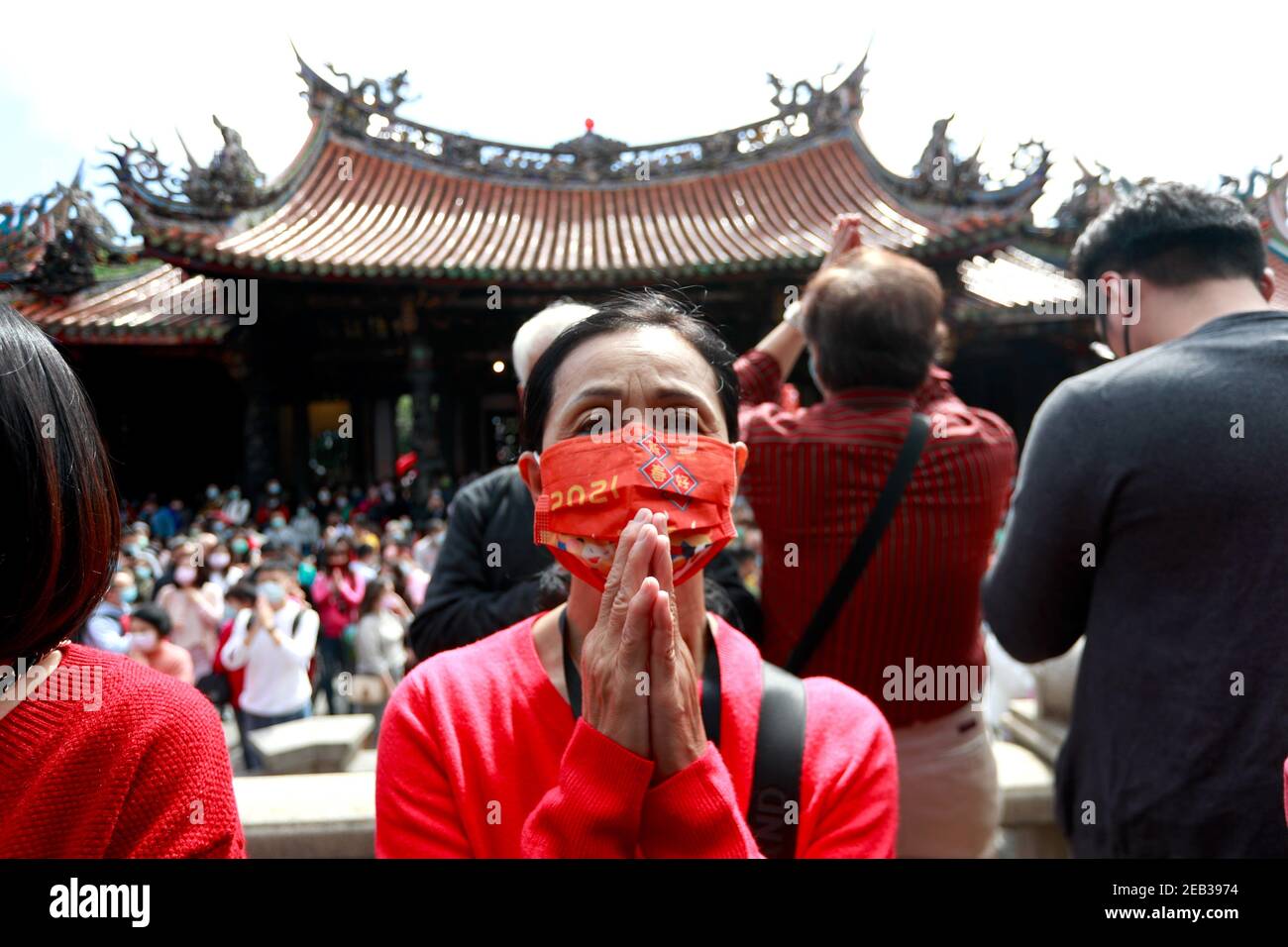 Taipei, Taiwan. 12th Feb, 2021. A Taiwanese wearing a mask with 2021 ...