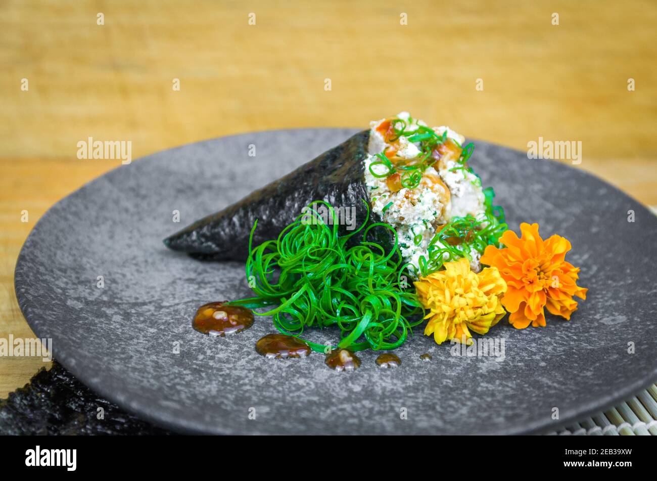 Temaki sushi. Traditional Japanese cuisine, premium Temaki of shrimp ...