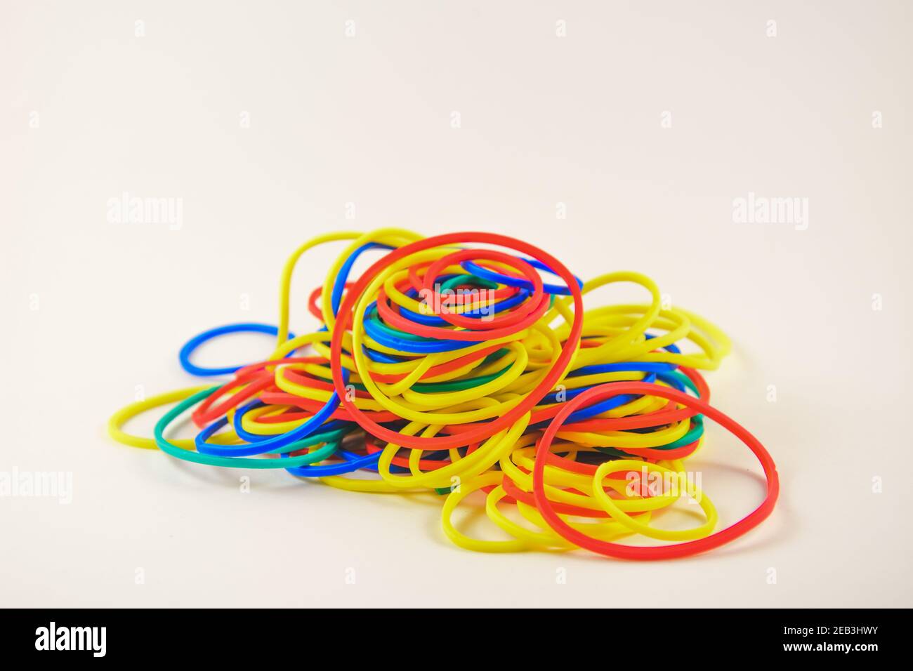 Colorful rubbers in everyday office life Stock Photo - Alamy