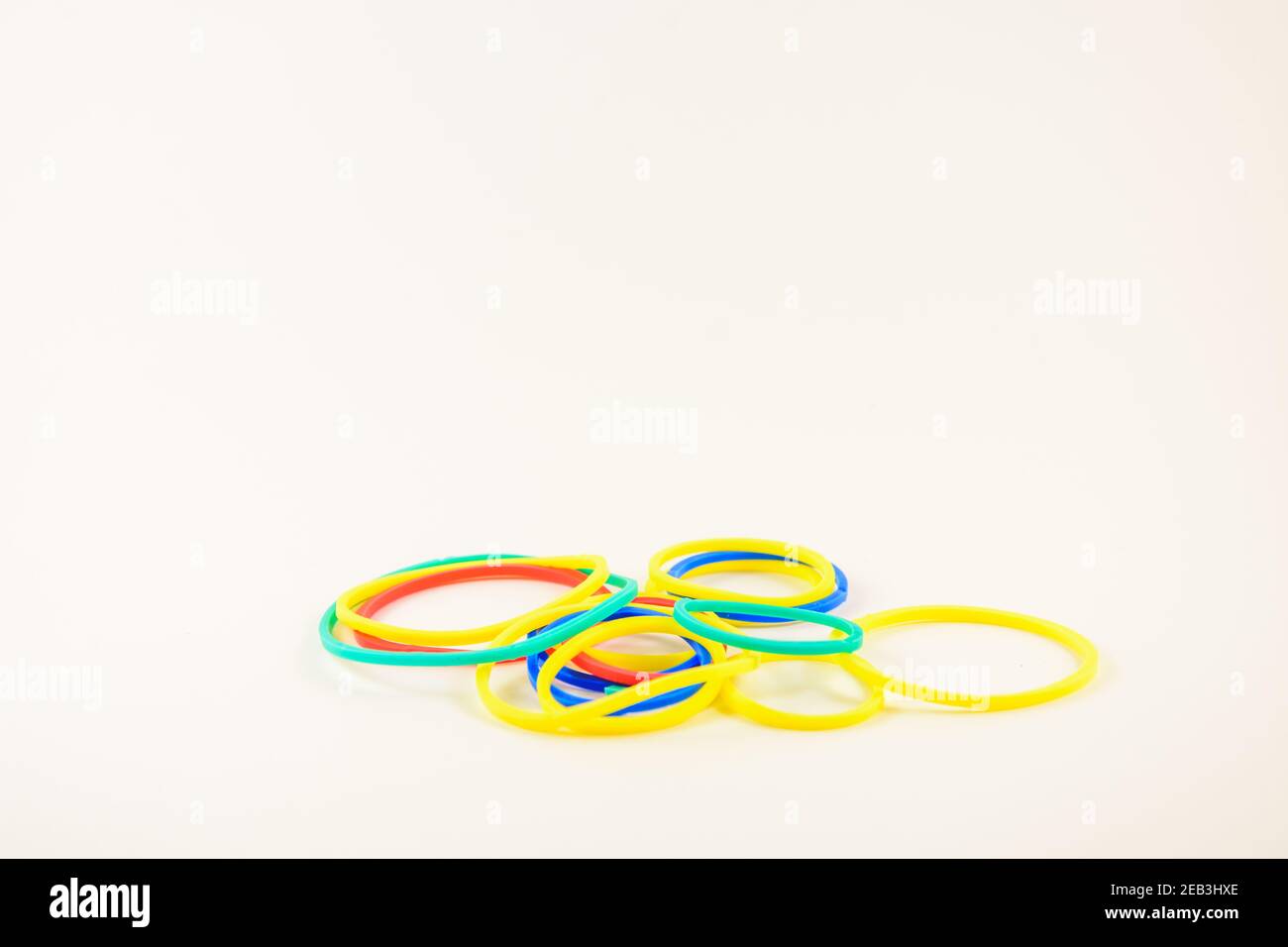 Colorful rubbers in everyday office life Stock Photo - Alamy