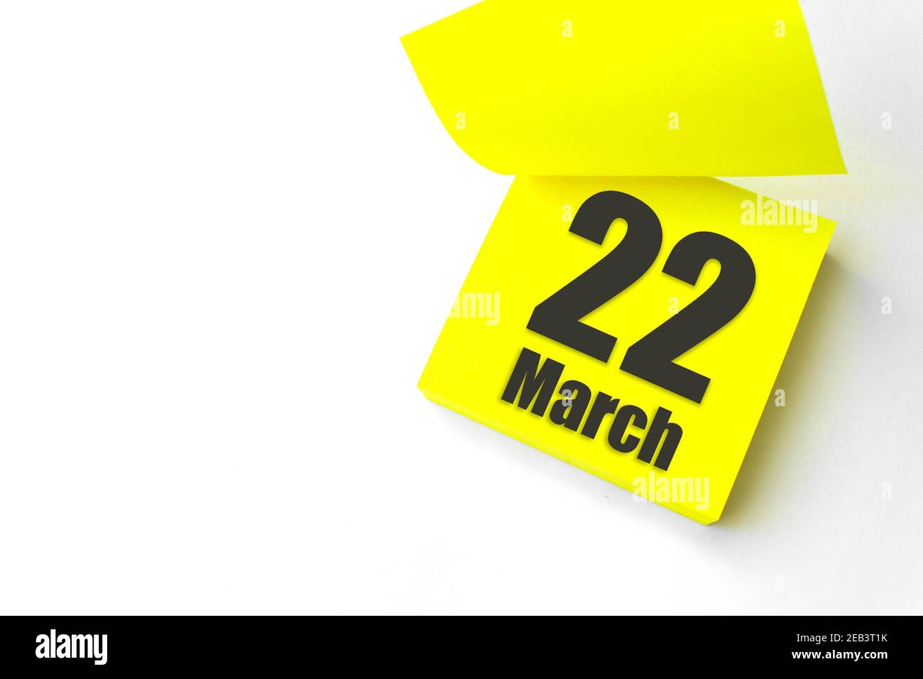 March 22nd. Day 22 of month, Calendar date. Close-Up Blank Yellow paper ...
