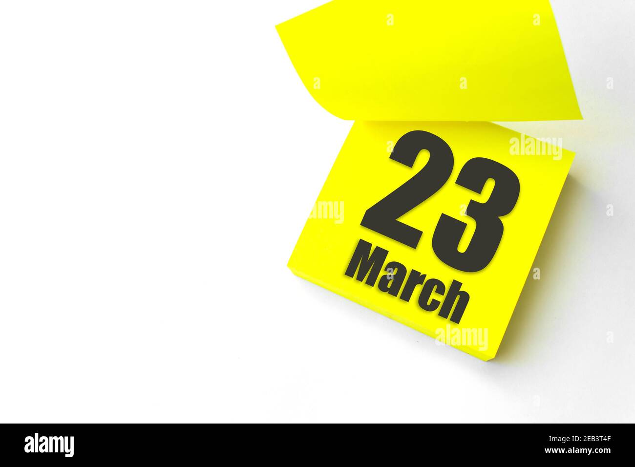 March 23rd. Day 23 of month, Calendar date. Close-Up Blank Yellow paper ...