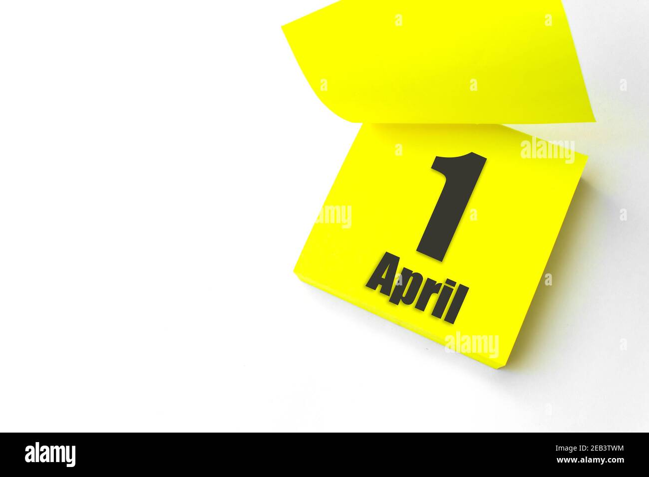 April 1st . Day 1 of month, Calendar date. Close-Up Blank Yellow paper ...