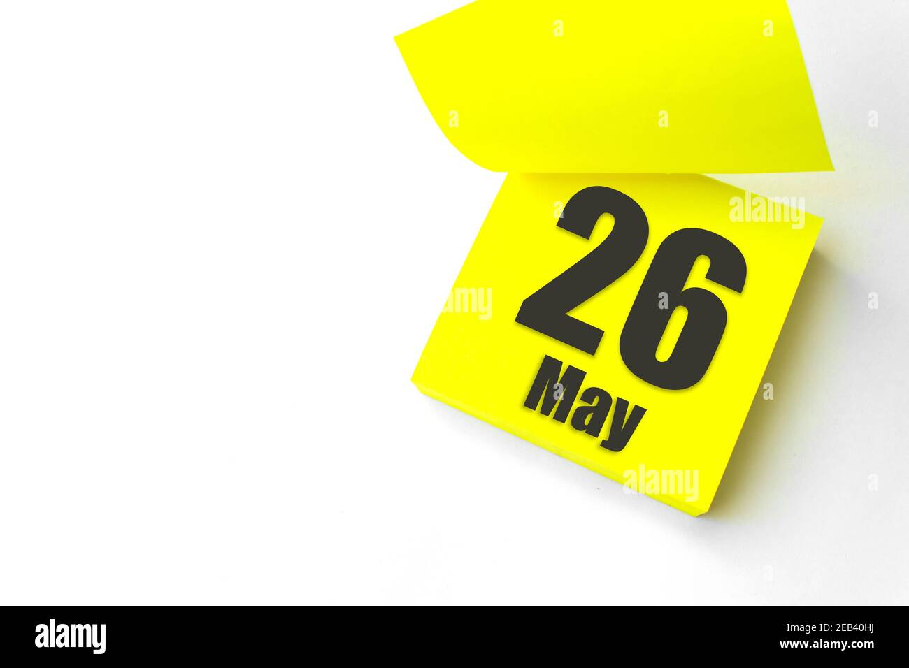 May 26th. Day 26 of month, Calendar date. Close-Up Blank Yellow paper ...