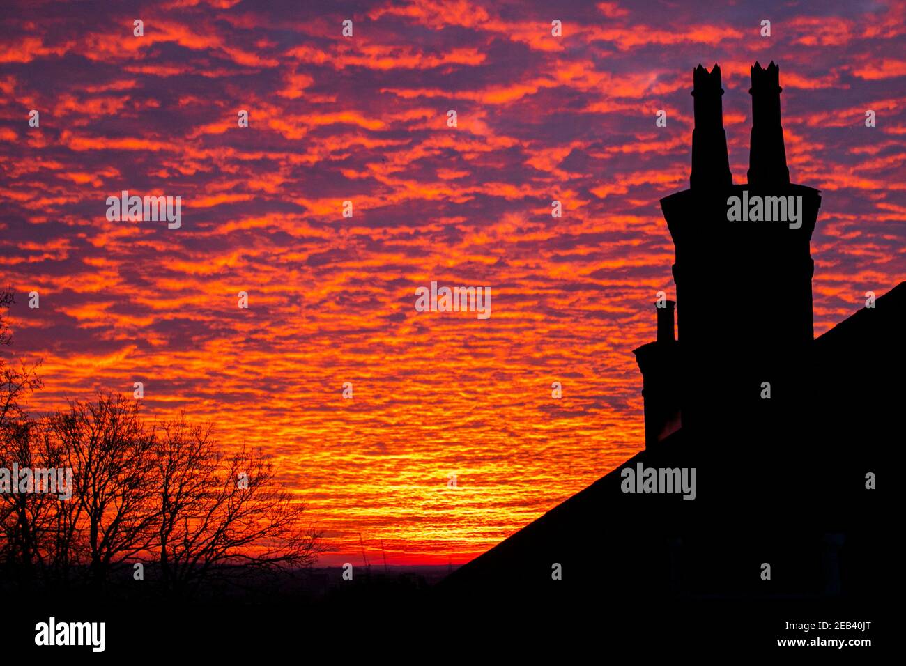 Smoke stacks over sunrise sky hi-res stock photography and images - Alamy