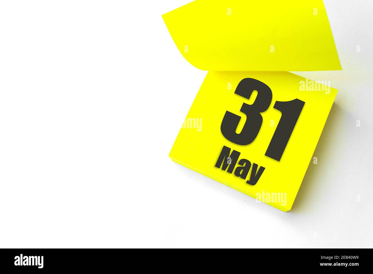 May 31st . Day 31 of month, Calendar date. Close-Up Blank Yellow paper ...