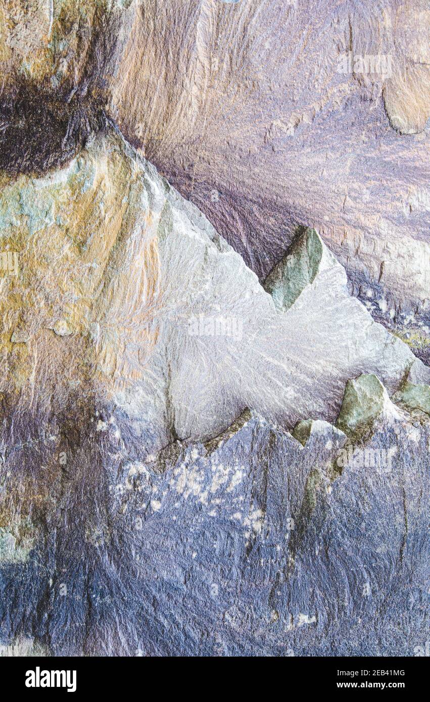 rock surface with colurs and jagged edges Stock Photo - Alamy