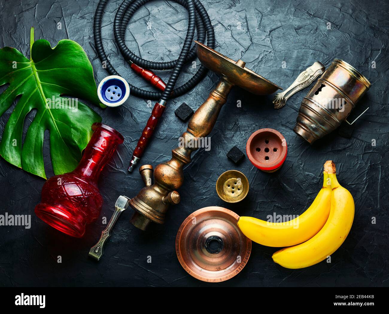 Smoking asian hookah with banana flavored shisha tobacco.Eastern shisha ...