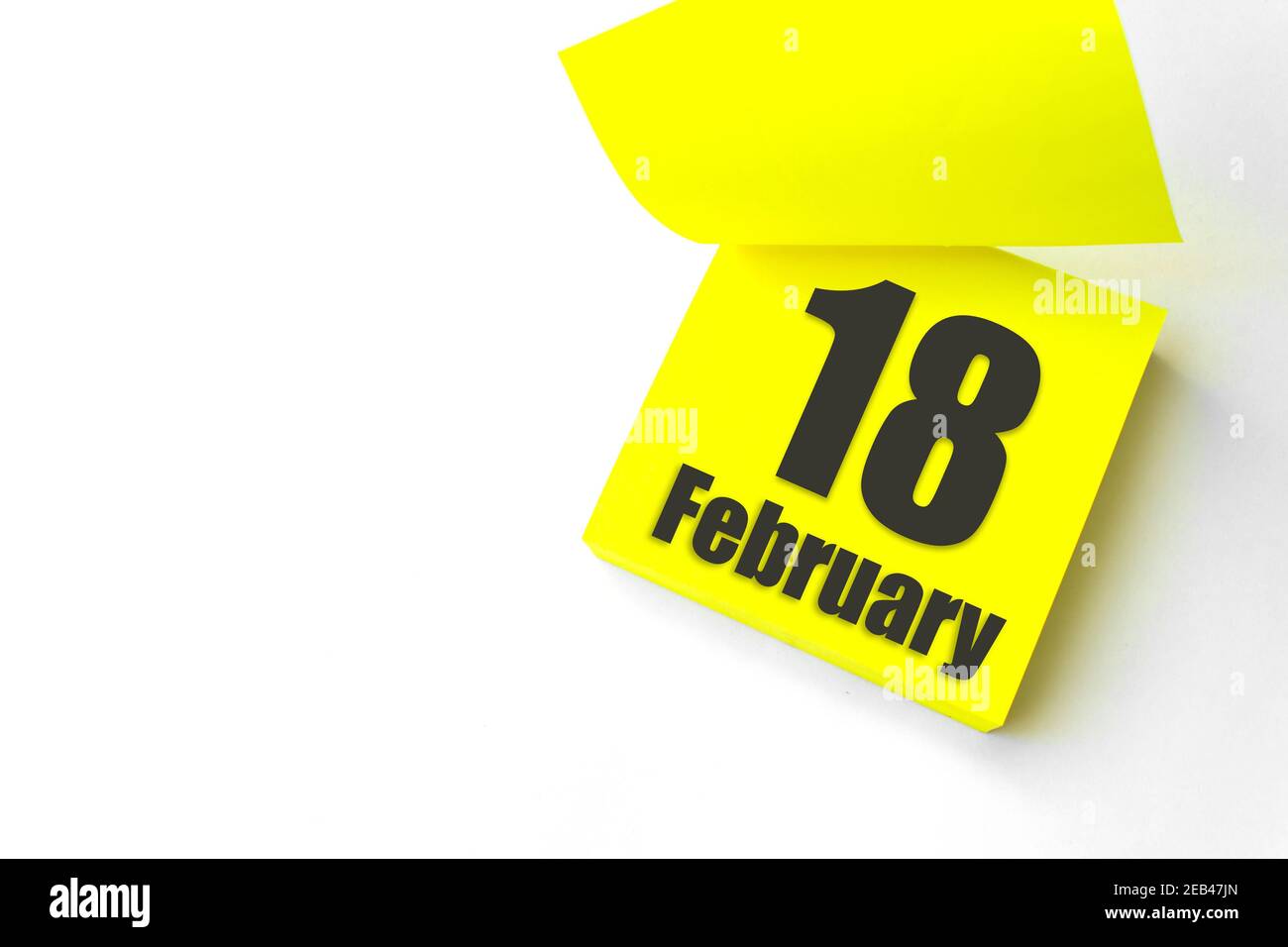 February 18th. Day 18 of month, Calendar date. Close-Up Blank Yellow ...