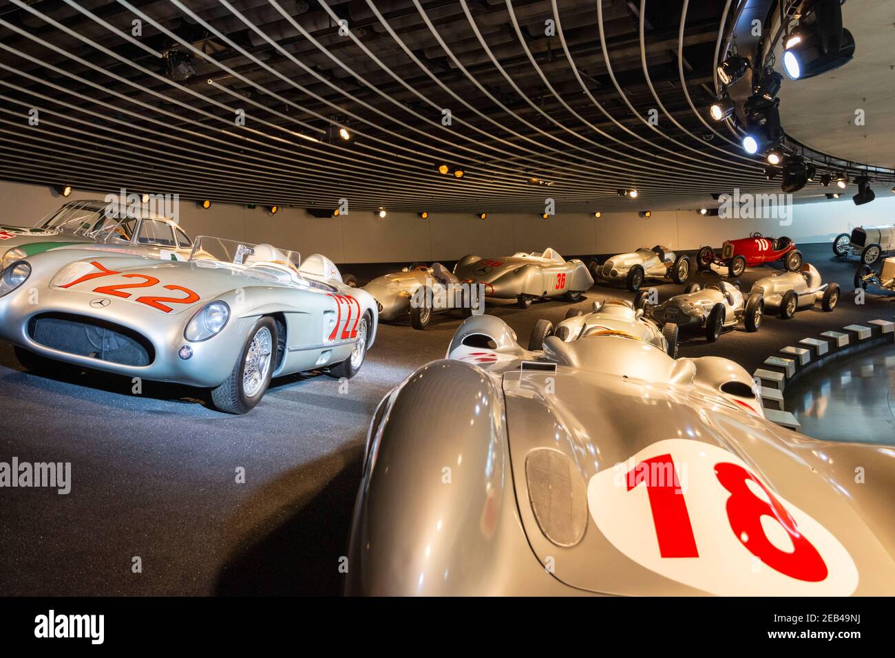 Interior of the Mercedes Benz Museum in Stuttgart, Germany. Old style cars and retro sport ...