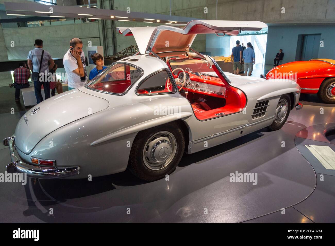 Interior of the Mercedes Benz Museum in Stuttgart, Germany. Old style cars and retro sport ...