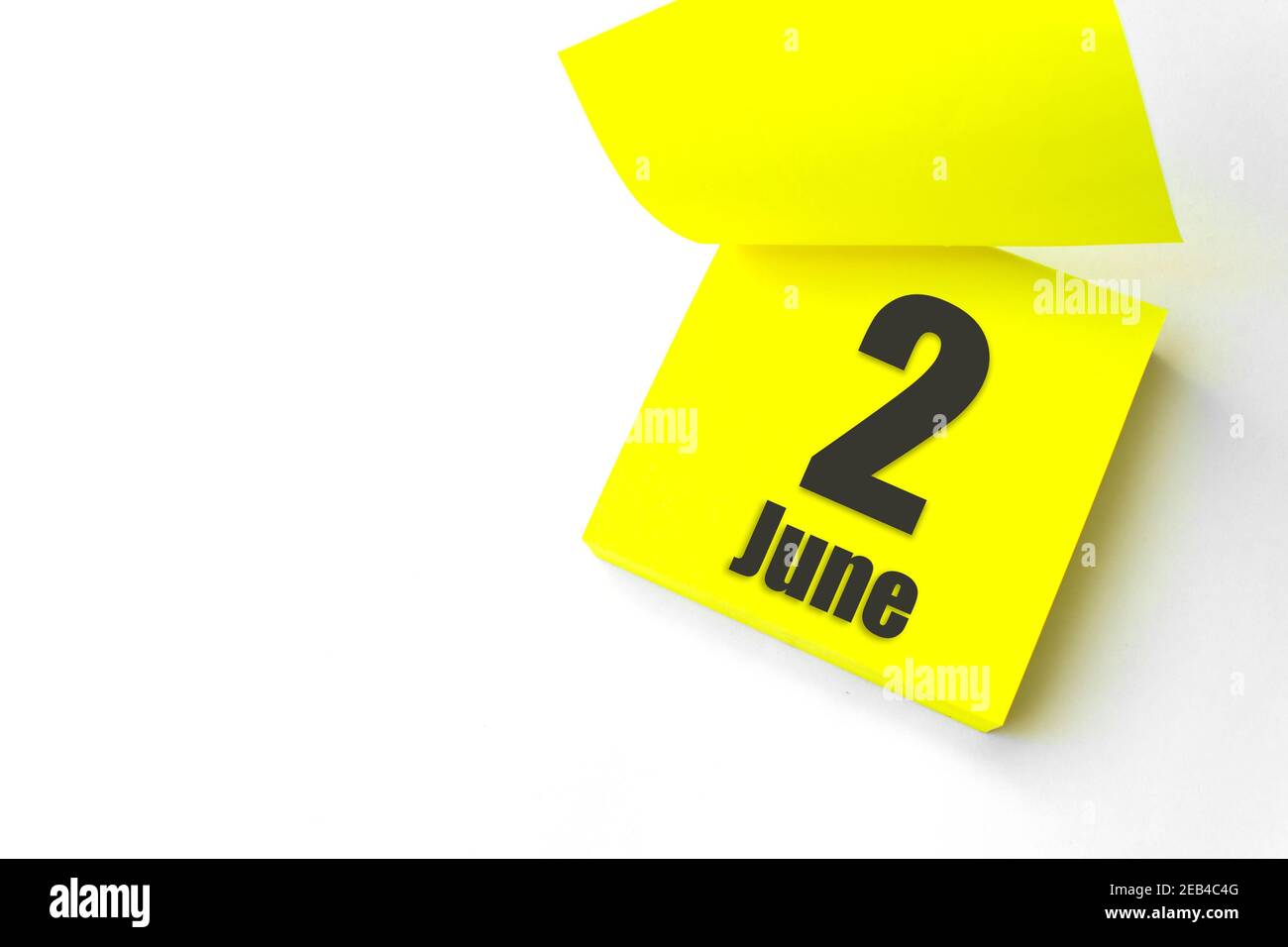 June 2nd. Day 2 of month, Calendar date. Close-Up Blank Yellow paper ...