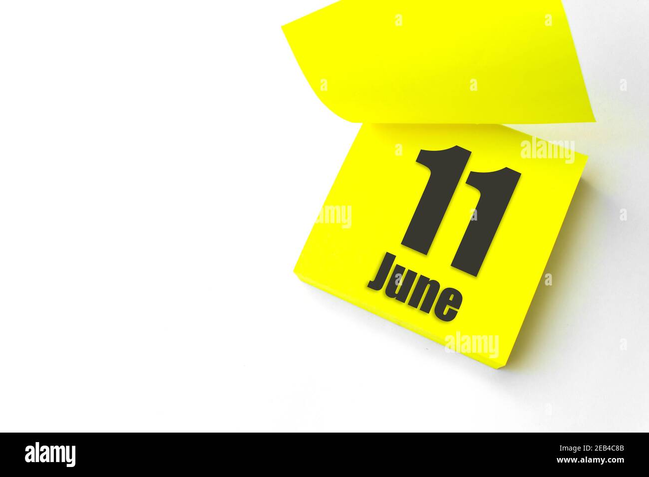 June 11st . Day 11 of month, Calendar date. Close-Up Blank Yellow paper ...