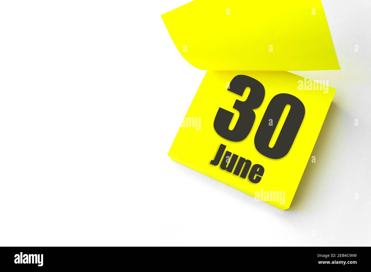 June 30th. Day 30 of month, Calendar date. Close-Up Blank Yellow paper ...