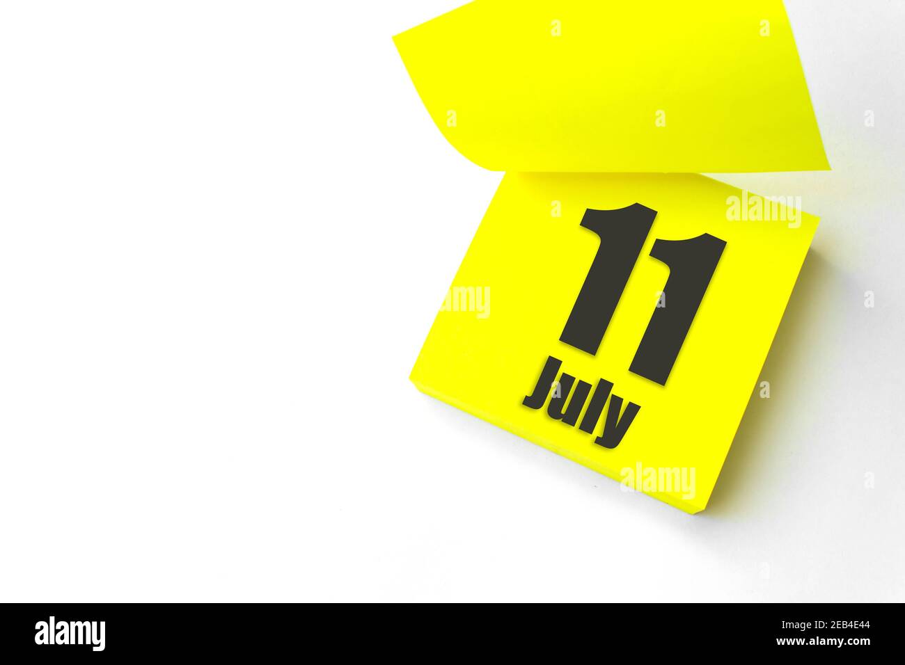 July 11st . Day 11 of month, Calendar date. Close-Up Blank Yellow paper ...